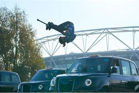 Watch Pogo Stick Daredevil Jumps Over Five Consecutive Cars For World Record