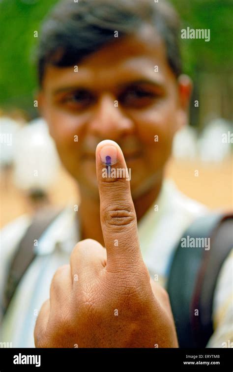 Indian Elections Finger With Indelible Ink Marking After Voting In