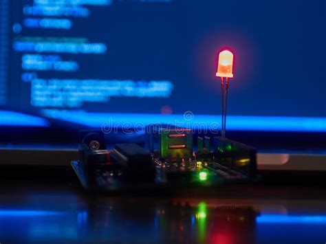 Arduino With Red Light Emitting Diode Against A Laptop Screen Stock Image Image Of Arduino