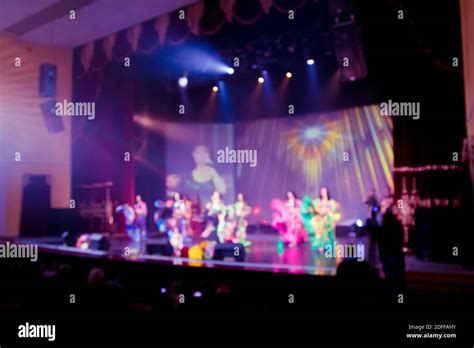 Texture Blur Scene Multicolored Lights And Smoke In Concert With Silhouettes Of People