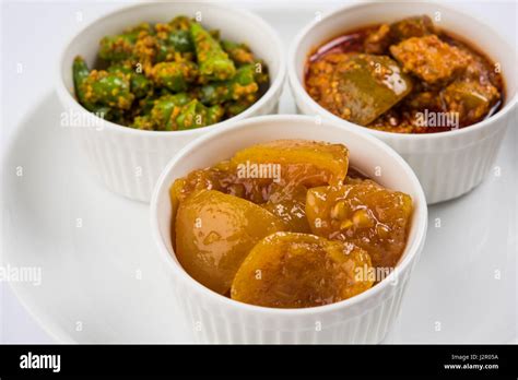 Group Photograph Of Indian Pickles Like Mango Pickle Lemon Pickle And Green Chilli Pickle