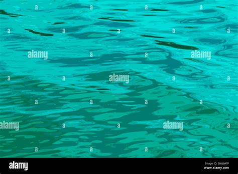 Illustration Of Water Ripple Texture Background Wavy Water Surface During Sunset Golden Light