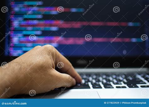 The Programmer S Hand Is Writing The Source Code Programmers Write