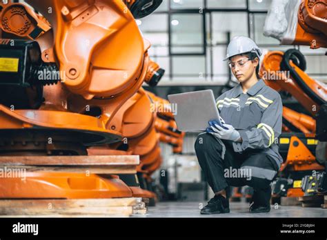 Engineer Woman Working In Advance Robotic Machine Factory Indian Female Engineering Staff Work