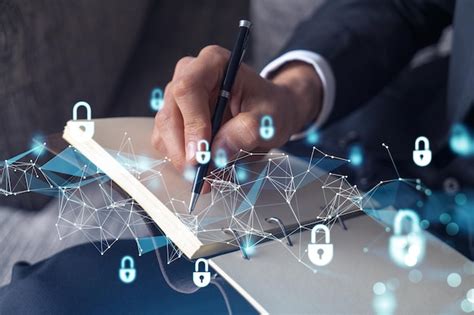 Premium Photo A Programmer Is Taking Notes Of Clients Needs To Protect Cyber Security From