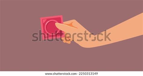 Hand Holding Contraceptive Condom Vector Cartoon Stock Vector Royalty