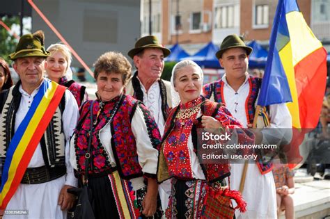 People Wearing Traditional Romanian Clothing In Transylvania Romania