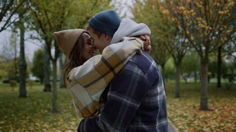 Premium Photo Beautiful Young Lovers Kissing Romantically In Autumn