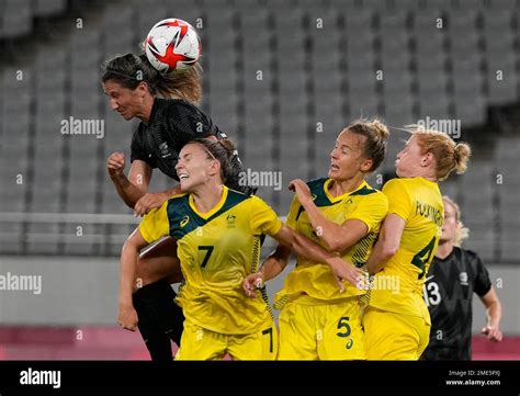 New Zealands Abby Erceg Left Top And Australias Steph Catley 7 Go