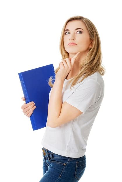 Premium Photo Young Woman Holding Book Against White Background