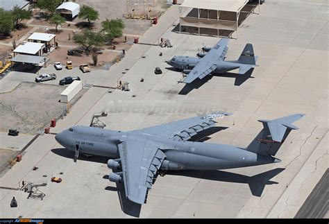 C5 Next To C130 R Fighterjets
