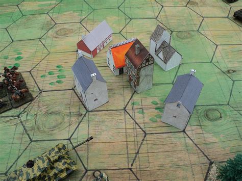 Archduke Piccolo Marking Up A Hex Grid Game Board