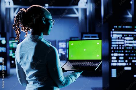 Computer Operator Builds Firewall Systems Using Green Screen Device In