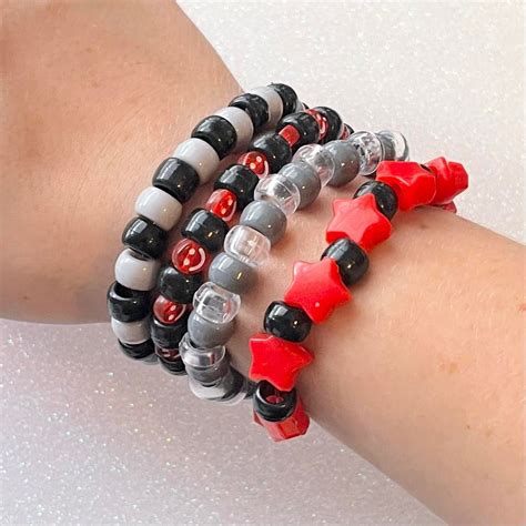 Black And Red Kandi Set Set Of Kandi Singles In Depop In Diy Kandi Bracelets