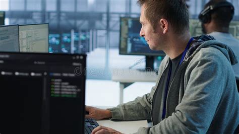 employee monitoring energy consumption across server rigs stock image image of employee