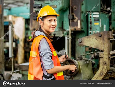 Female Engineers Operating Cnc Machine Factory Portrait Smiling Worker Pushing Stock Photo