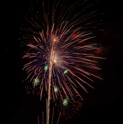 Premium Photo Beautiful Of Exploding Fireworks At Night Represents A Celebration Premium Photo Beautiful Of Exploding Fireworks At Night Represents A Celebration