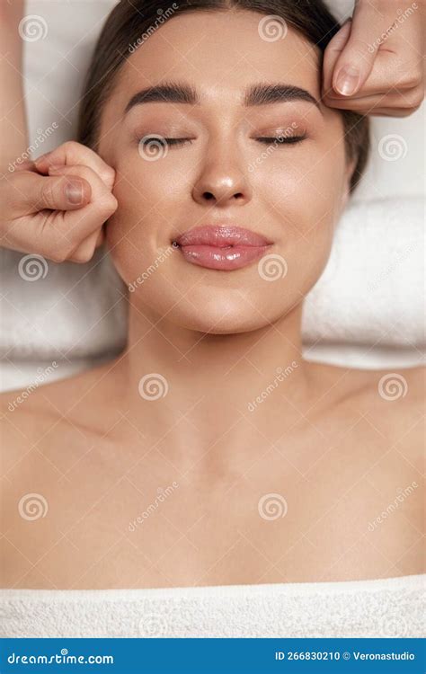 Face Massage Beautiful Of Young Woman Getting Spa Massage Treatment