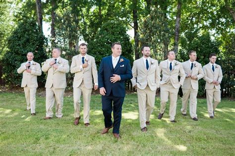Navy Blue Groom With Tan Groomsmen And Matching Ties Blue Groomsmen Tan Groomsmen Groomsmen