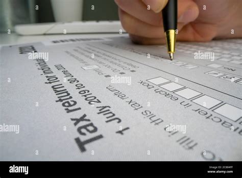 Completing Australian Tax Form Stock Photo Alamy