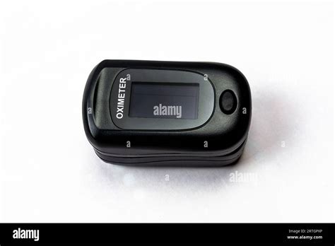 Digital Pulse Oximeter Photographed On A White Background In High Key