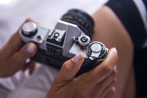 Young Woman Holding Analog Camera On Her Lap Stock Image Image Of