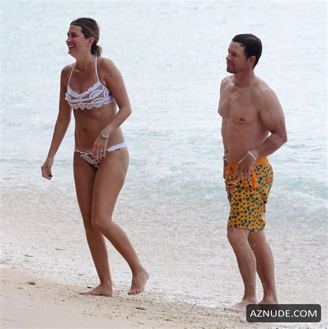 Rhea Durham And Mark Wahlberg Share A Romantic Moment While Swimming During Their Vacation In
