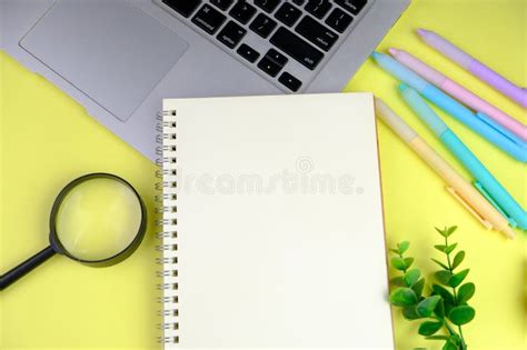 Home Office Workspace Mockup With A Notebook On Yellow Background Stock