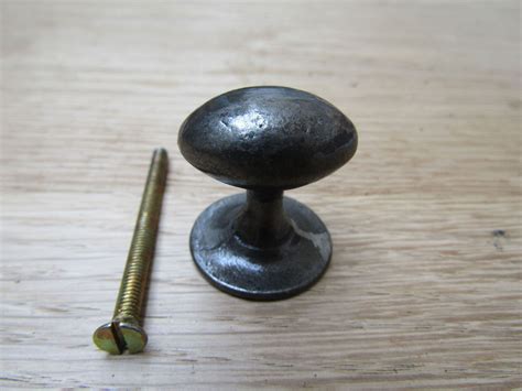 Small Oval With Base Cupboard Knob Antique Iron