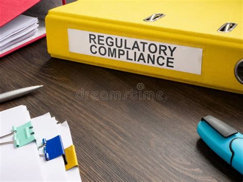 Folder With Regulatory Compliance And Papers Stock Image Image Of