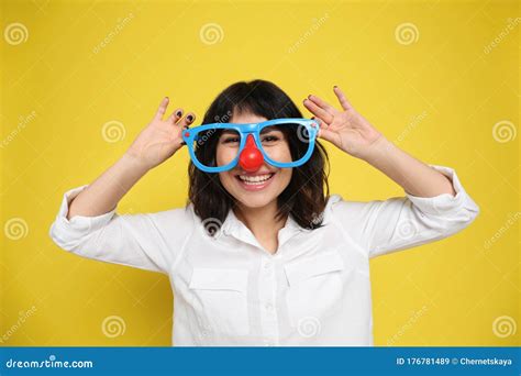 Joyful Woman With Funny Glasses On Background April Fool`s Day Stock