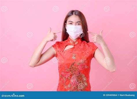Beautiful Young Chinese Women Use Face Masks To Protect Against Dust