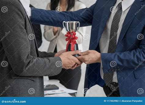 Manager Giving Employee The Trophy Award For Success In Business Stock Photo Image Of