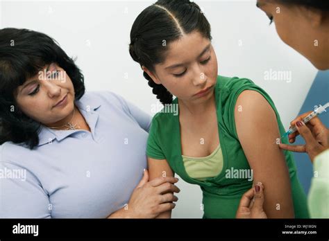 Girl Having Injection Stock Photo Alamy
