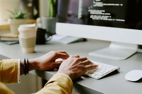 Premium Photo Hands Of Male Programmer Typing Code