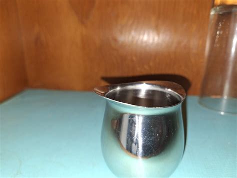 4 Metal Small Pitchers