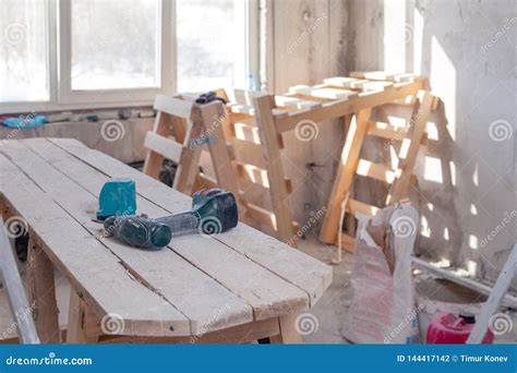 Wooden Scaffolding Stand At The Window In A Large Empty Room Repair