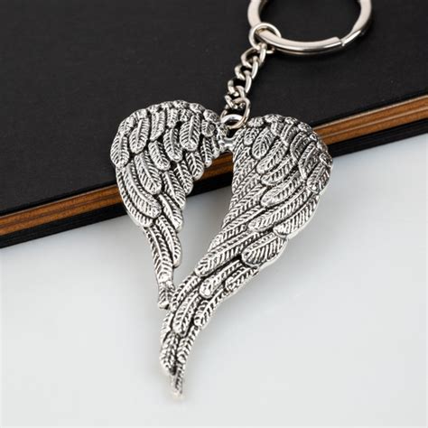 Брелок сердце крылья ангела купить с доставкой по выгодным ценам в интернет магазине Ozon