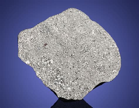 Endpiece Of A Meteorite From The Asteroid Vesta Interior And Exterior Revealed In Nwa 12011