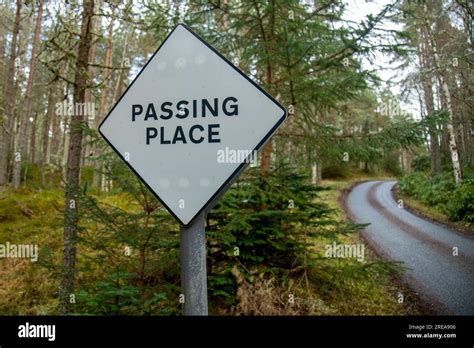 White Passing Place Traffic Sign On A Narrow Single Track Road In The