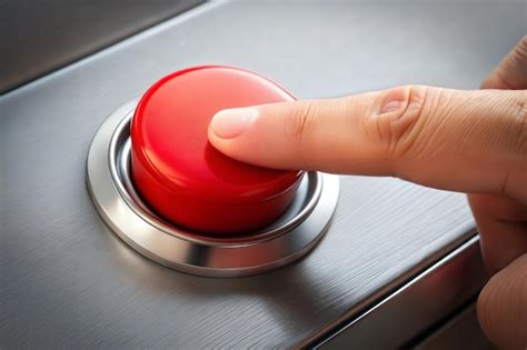 a red button is being pressed by a persons finger premium ai