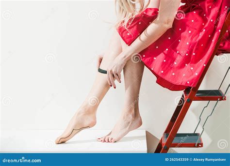 Wooman In Red Dress Dressing Vintage Stockings Stock Image Image Of