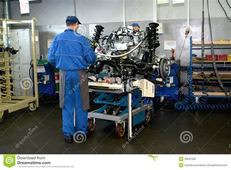 work on a site of subassembly of automobile engines assembly sh editorial photo image of