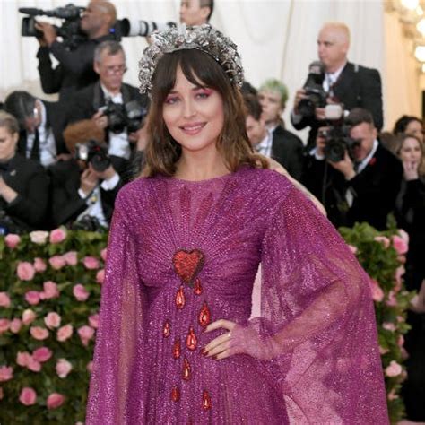 Dakota Johnson Wears Bleeding Heart Dress With Crown To Met Gala 2019
