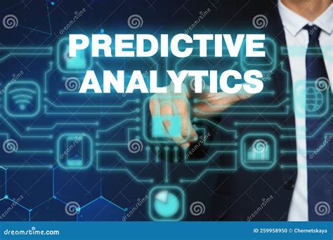 Concept Of Predictive Analytics Businessman Pointing At Phrase On Virtual Screen Closeup Stock