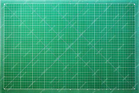 Background And Textured Of Cutting Mat Green Color With Lines And Grid Marks Textured Background