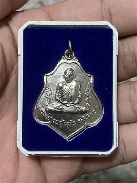 หลวงพ่อกวย วัดโฆสิตาราม ชัยนาท เหรียญโล่ห์หลังยันต์ หลวงพ่อกวย วัดโฆสิตาราม เนื้ออัลปาก้า รุ่น