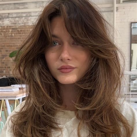 Feathered Bangs Are Again And Chicer Than Ever Michigan Post