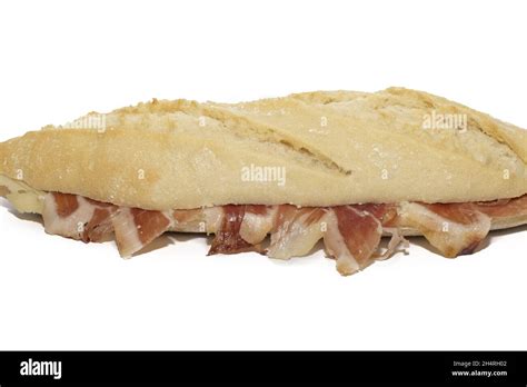 Traditional Spanish Bocadillo Ham Sandwich With A Crusty Bread Isolated
