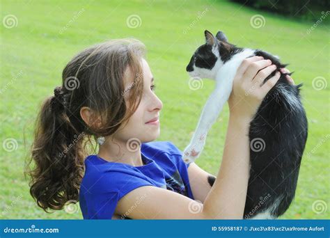 Young Girl Playing With Her Cat Stock Image Image Of Young Summer